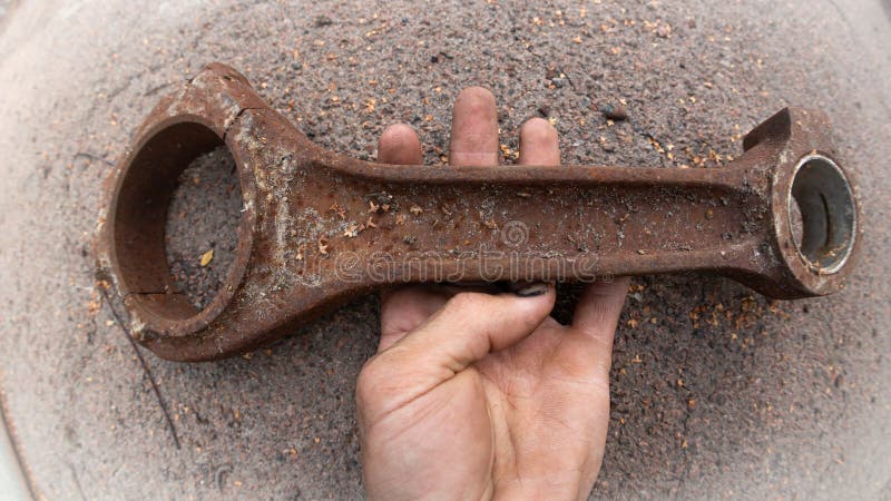 Rusty Connecting Rod in Hand: Old Engine Part Stock Photo - Image of ...