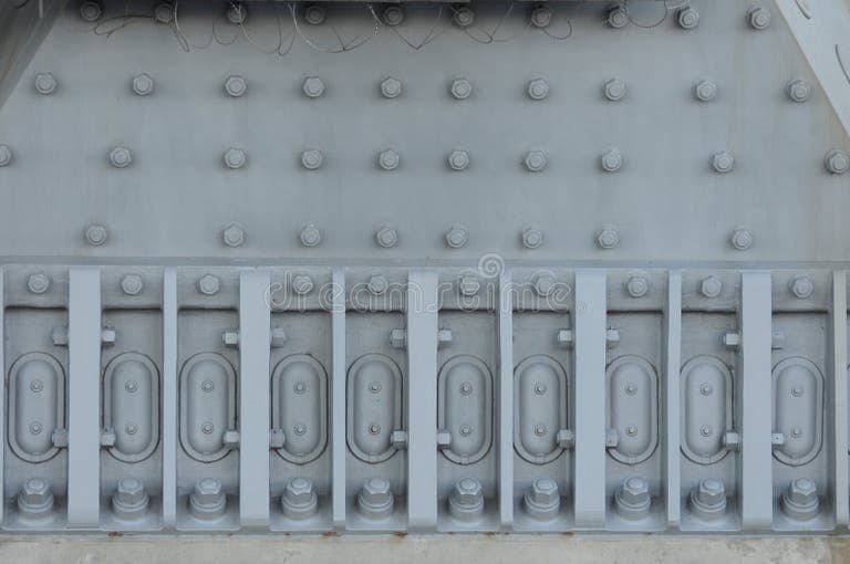 Close-up of Metal Structure with Bolts and Rivets in a Geometric ...