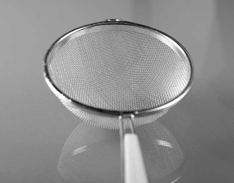 Close Up of Metallic Strainer with Plastic Handle Stock Photo - Image ...