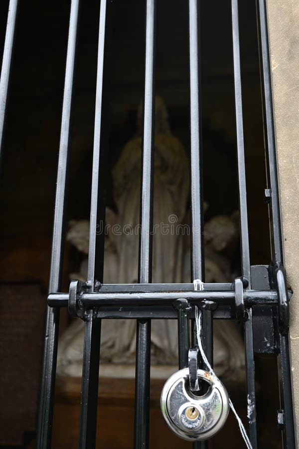 Close-up of a Metallic Window Lock with a Key Attached, Mounted on a ...