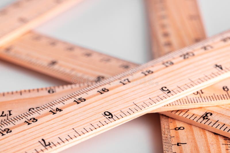 Close Up of Metric and Imperial Rulers on White Background Stock Image ...