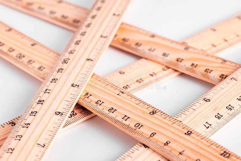 Close Up of Metric and Imperial Rulers on White Background Stock Image ...