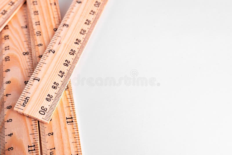 Close Up of Metric and Imperial Rulers on White Background Stock Image ...