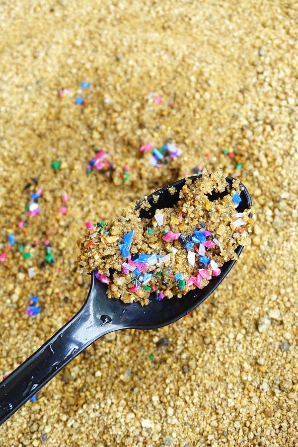 Microplastic Pollution on the Beach Sand Stock Photo - Image of sand ...