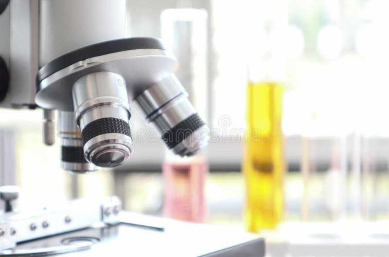 Red Liquid in Glass Testing Flask on the Rack. Alcolhol Lamp Place ...