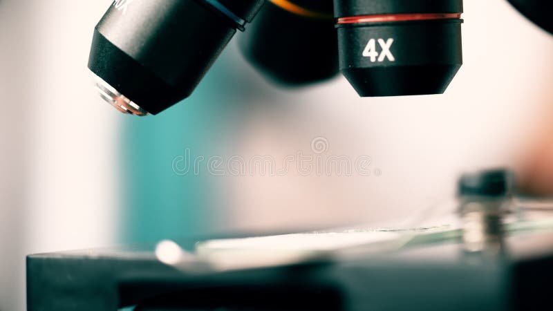 Close-up of Microscope Lens with Sample in Laboratory Stock Footage ...