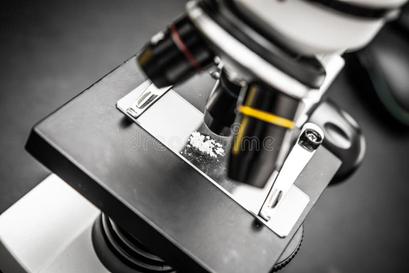 Close-up of Microscope Objective Lenses Focusing on a Slide with ...