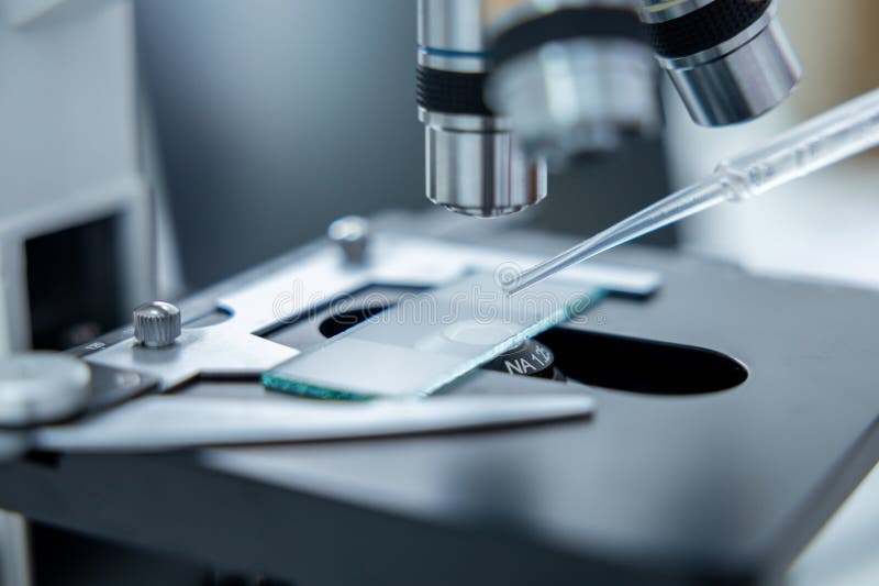 Close Up of a Microscope with a Test Glass Under the Lens Stock Image ...