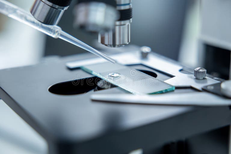 Close Up of a Microscope with a Test Glass Under the Lens Stock Image ...