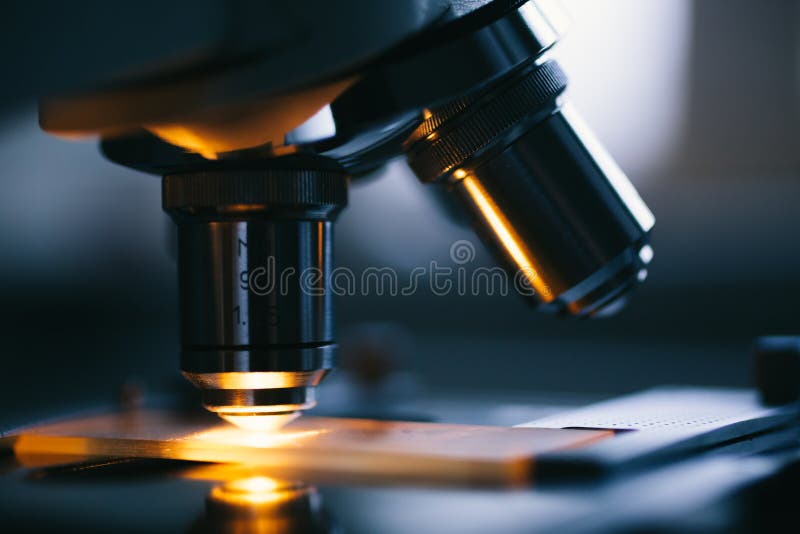 Close Up Of Examining Of Test Sample Under The Microscope Stock Image ...