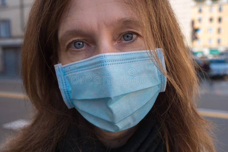 Close-up of a Middle-aged Lady with a Surgical Mask Outdoors Stock ...