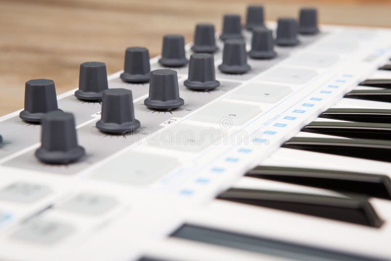 Close Up of MIDI Controller Volume Fader, Knob and Keys. Stock Image ...