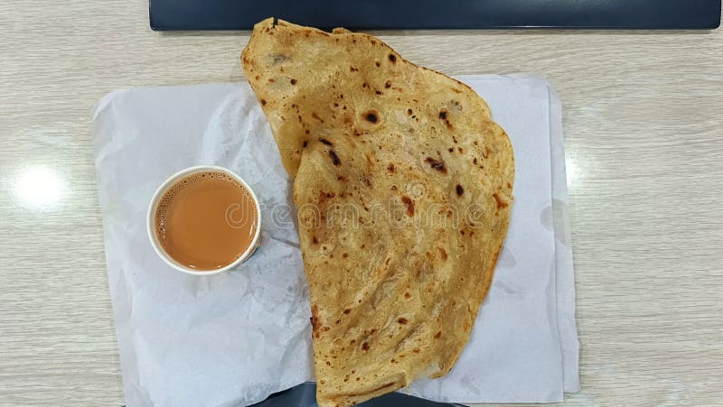 Close Up of Paratha and Milk Tea Karak Chai Tea Stock Photo - Image of ...