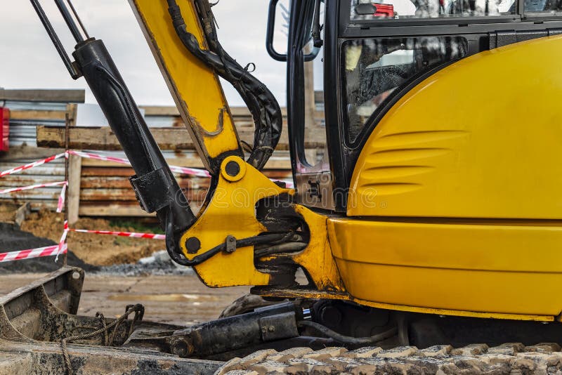 Close-up Mini Excavator during the Construction of a Modern Residential ...