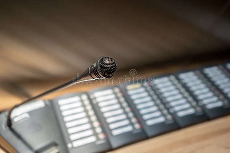 Close Up of Mini Microphone at the Reception Desk in Office Building ...