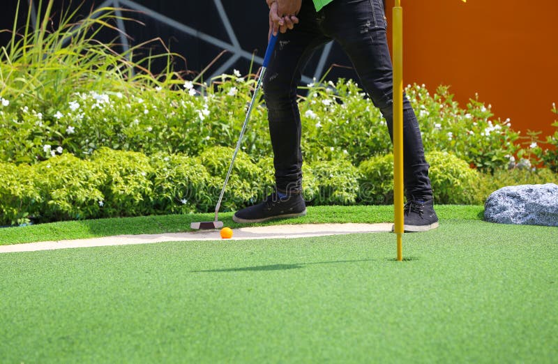 Close-up of Miniature Golf Hole with Bat and Ball. Stock Image - Image ...