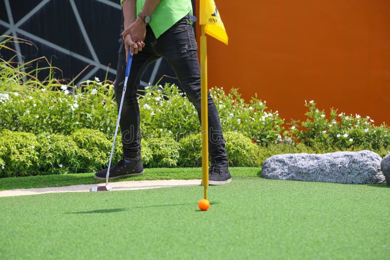 Close-up of Miniature Golf Hole with Bat and Ball. Stock Photo - Image ...