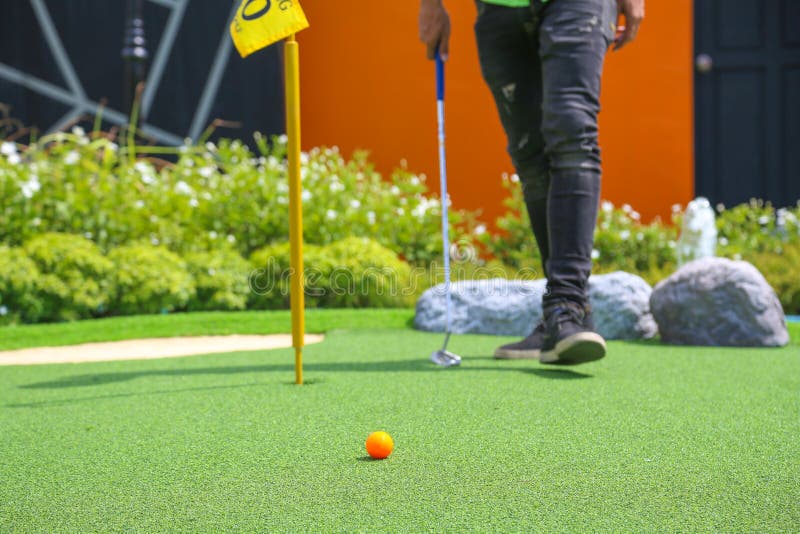 Close-up of Miniature Golf Hole with Bat and Ball. Stock Image - Image ...