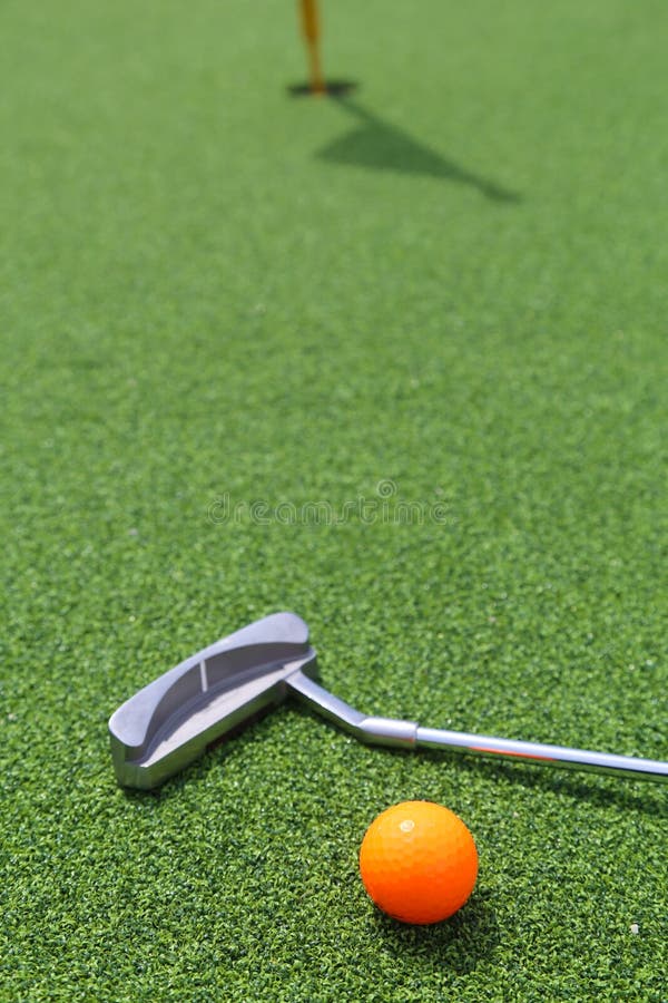 Close-up of Miniature Golf Hole with Bat and Ball. Stock Photo - Image ...