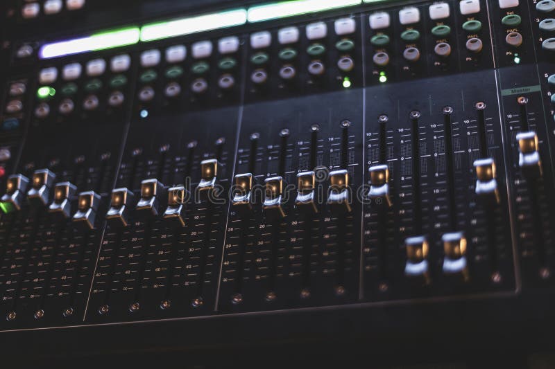 Professional Mixing Console Showing Faders and Knobs in Recording ...
