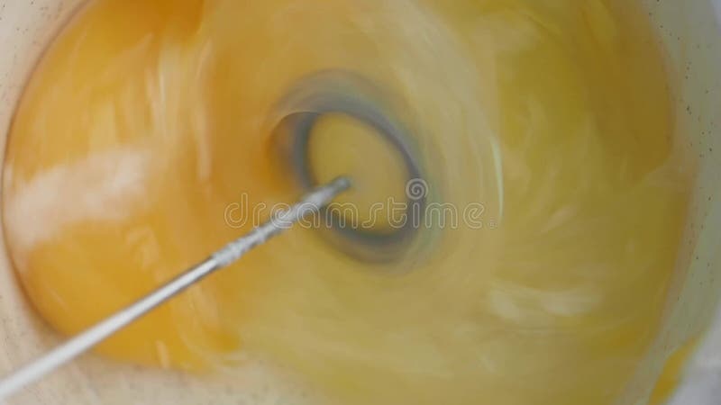 Close-Up of Mixing Process in Liquid Solution with Whirling Motion ...