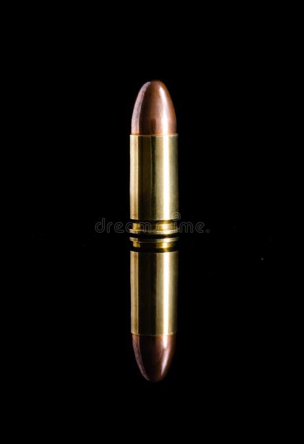 Close-up 9mm Bullet for a Gun and Reflection Isolated on a Black ...