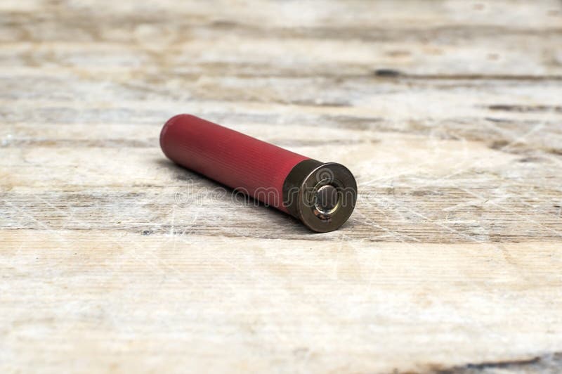 Close Up of 12mm Bullet on Wooden Table. Stock Image - Image of power ...