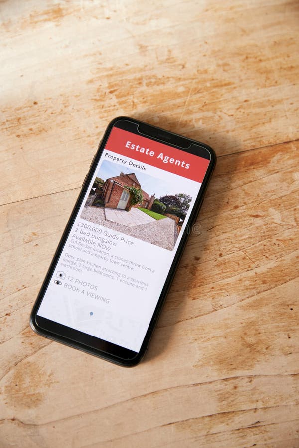 Close Up of Mobile Phone with Realtors Property App Lying on Table ...