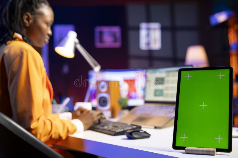 Close Up of Mockup Electronic Device Next To Remote Employee Using ...
