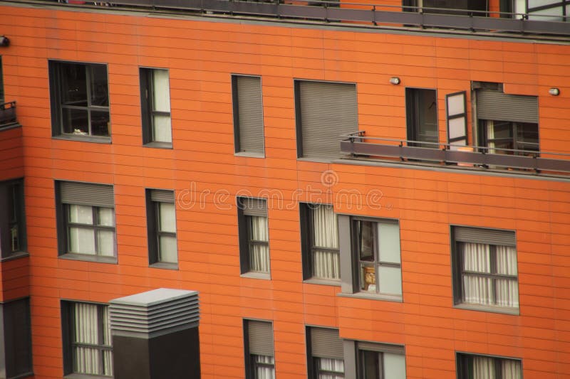 Modern Apartment Building with Orange Facade Editorial Photography ...