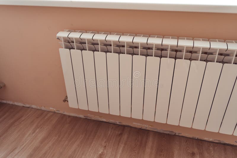Close Up of Modern Battery in Room. White Heating Radiator Indoor ...