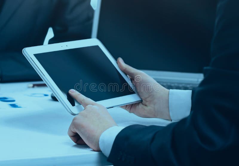 Close-up of a Modern Business Team Using Tablet Computer Stock Image ...