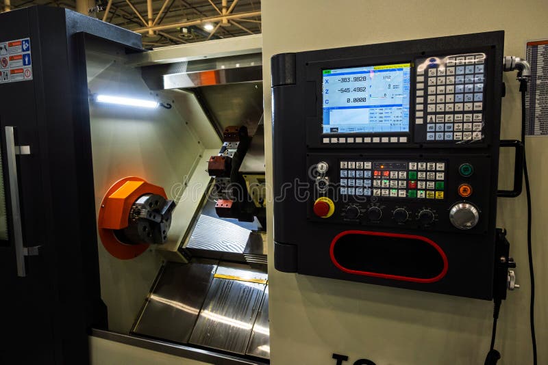 Close-up of a Modern CNC Lathe Machine with Control Panel and Internal ...