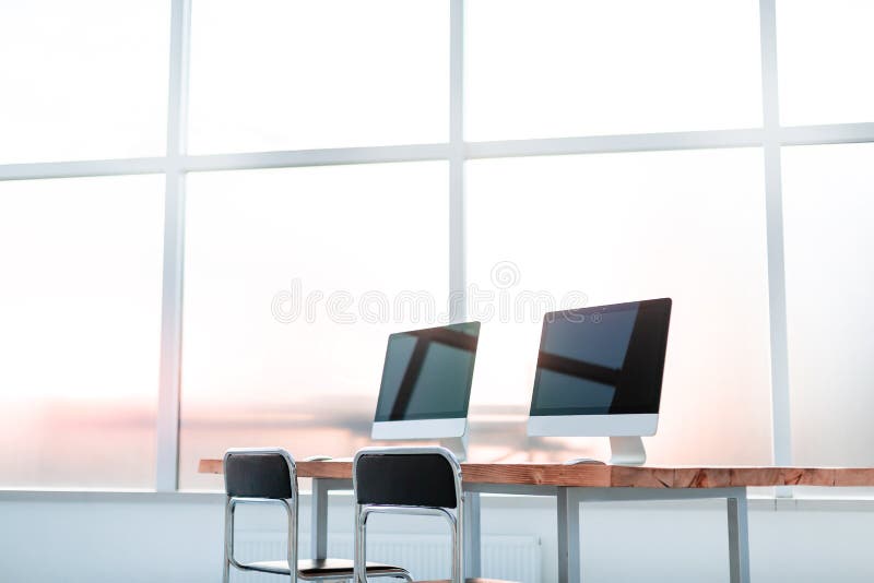 Close Up. Modern Computers on a Wooden Table Stock Image - Image of ...