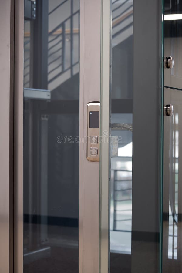 Close-up of Modern Elevator Control Panel and Glass Door Stock Image ...