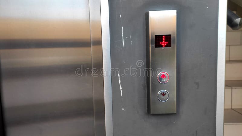 Close-up of Modern Elevator Control Panel with Red Arrow Indicator ...
