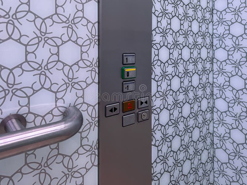 Close-up of Modern Elevator Control Panel with Stainless Steel Handrail ...