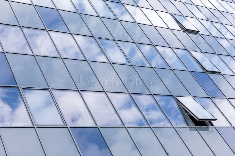 Close-up of Modern, Just-build Building with Sky Reflection on Facade ...