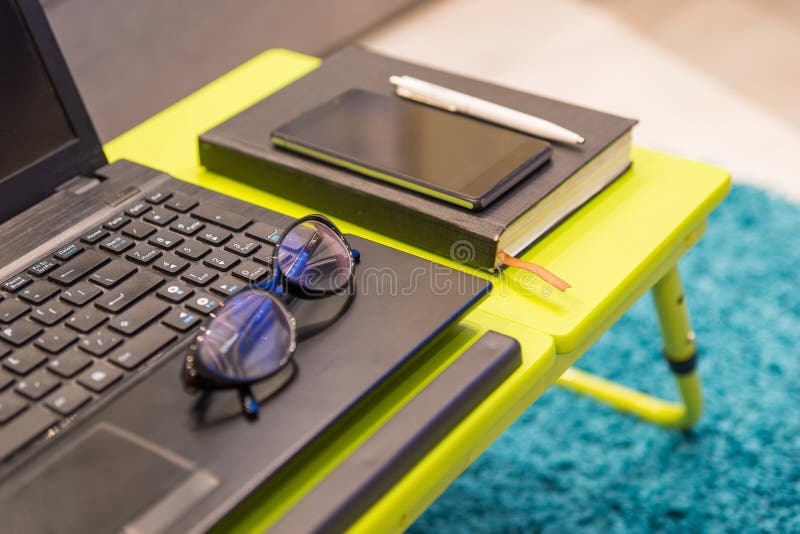 Close Up of a Modern Tabletop Workstation with Stylish Eyeglasses Stock ...