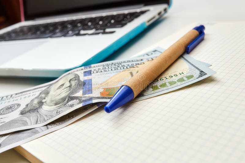 Close-up of Money with Pen on a Notepad Stock Photo - Image of business ...