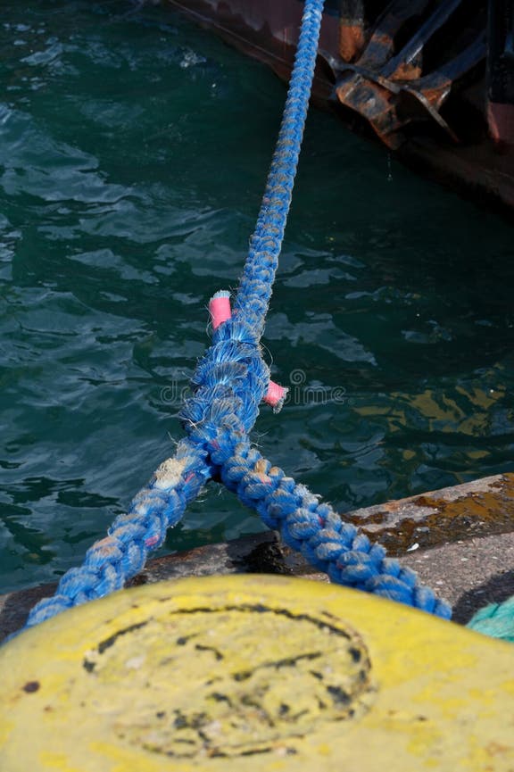 Mooring bollard with rope. stock photo. Image of iron - 375005152