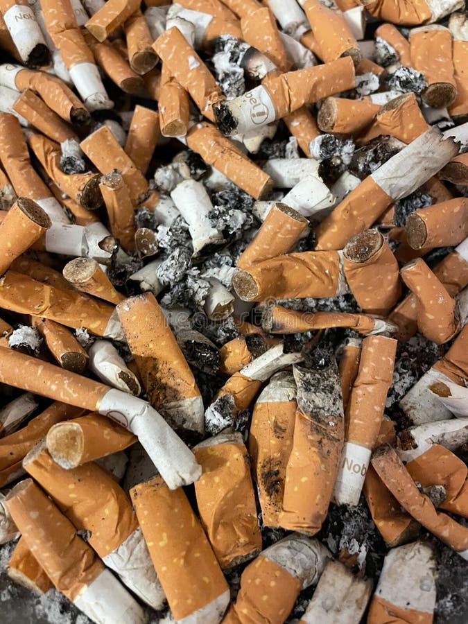 Close-up of a Mountain of Cigarette Butts Burnt with Ash Stock Photo ...