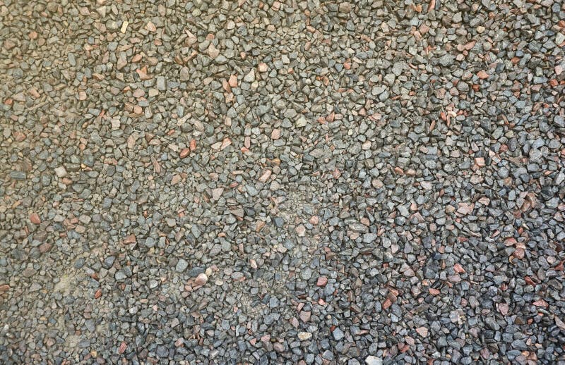 Close Up of Muddy Puddle with Small Stones on Wet Surface. Background ...