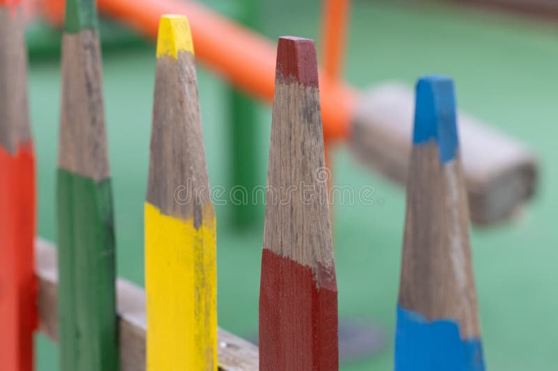 Close Up Multi Colored Fence in the Form of Large Colored Pencils. Copy ...
