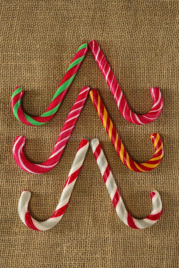 Multicolored Candy Canes Arranged on Fabric Stock Photo - Image of ...