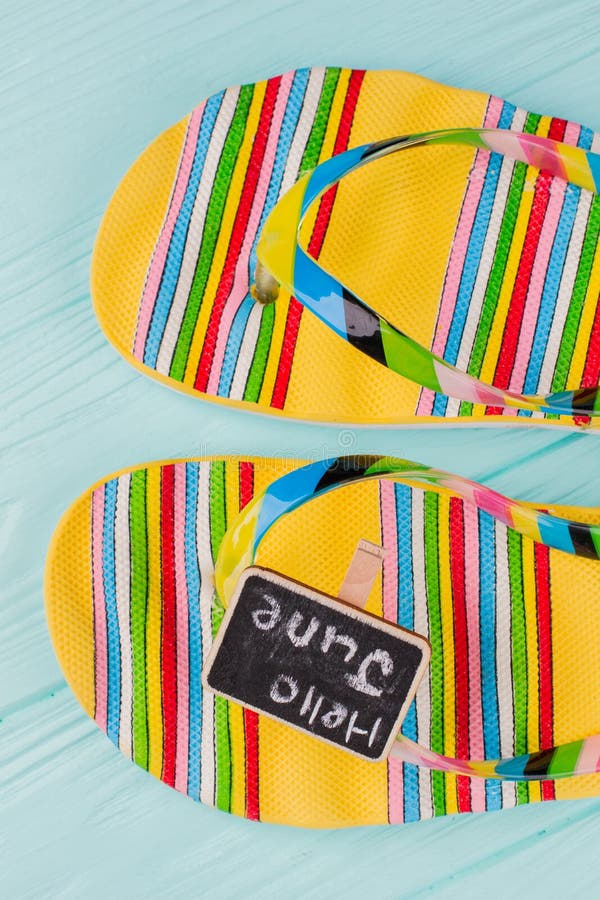Close-up Multicolored Sandals on Blue Desk. Stock Photo - Image of ...