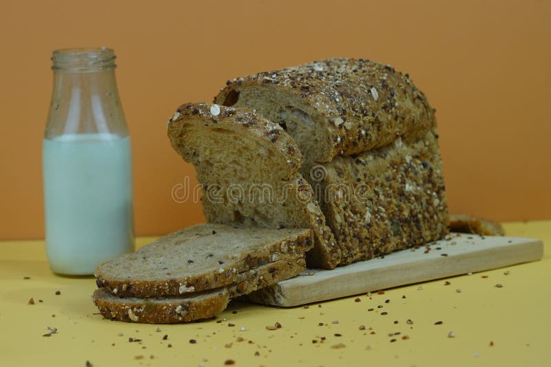 Multigrain Bread and Milk for Breakfast Stock Image - Image of wooden ...