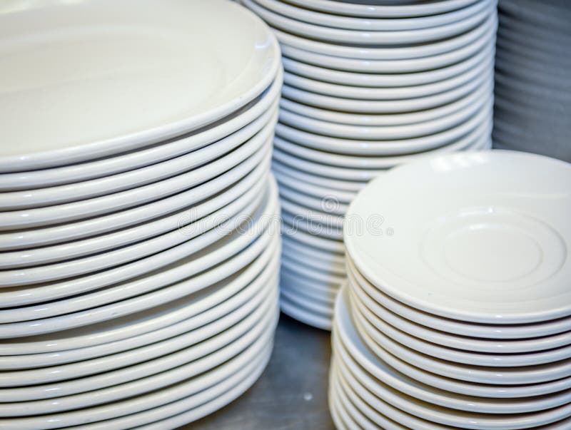Close Up of Multiple Stacks of White Plates Stock Photo - Image of food ...