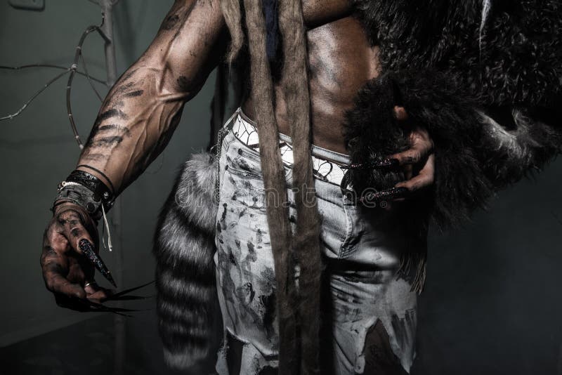 Close-up Muscular Werewolf among the Branches of the Tree Stock Photo ...