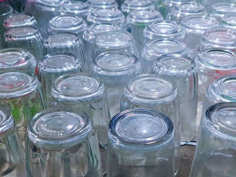 Close-up of Neatly Arranged Upside-down Glass Cups on a Table, Creating ...